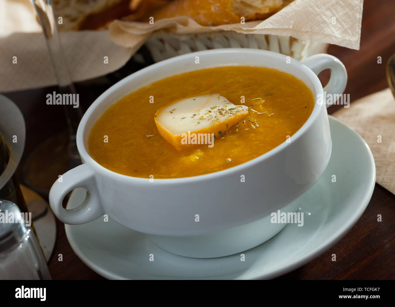 Appetizing vegetable soup puree served with cheese in bowl Stock Photo ...