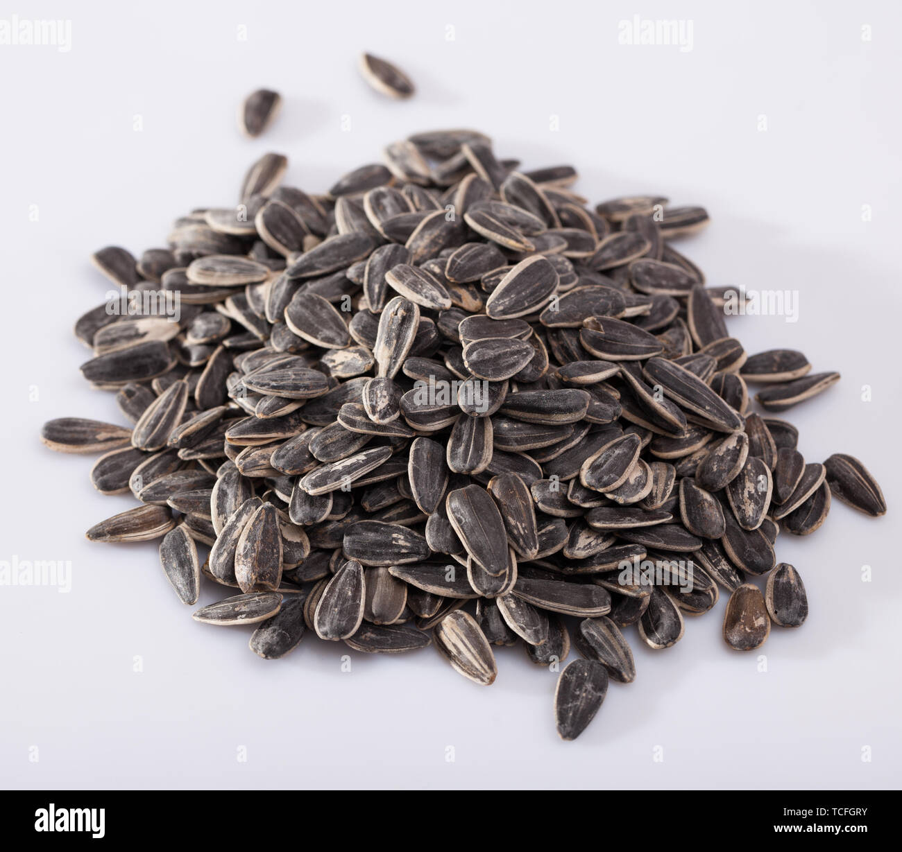 Macro black unpeeled sunflower seeds hi-res stock photography and ...