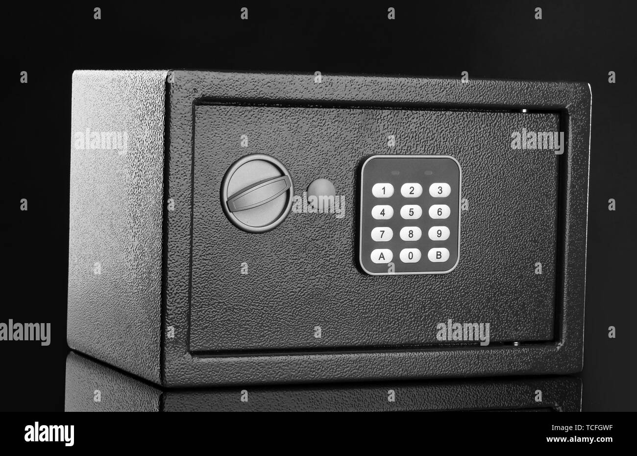 Combination lock on black Black and White Stock Photos & Images - Alamy