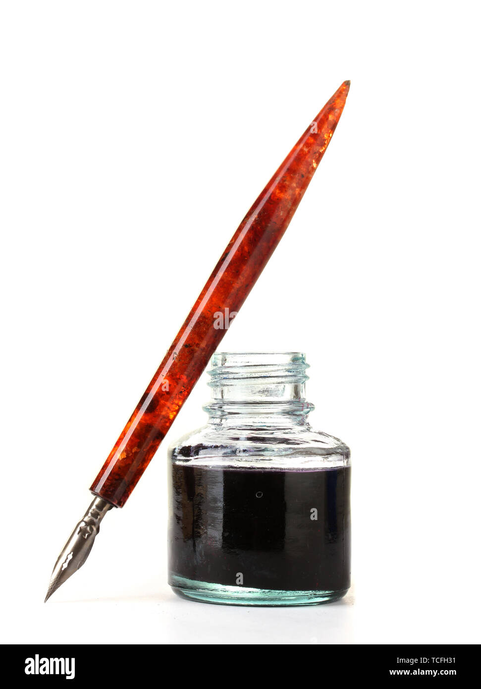 old ink pen and ink bottle isolated on white Stock Photo - Alamy