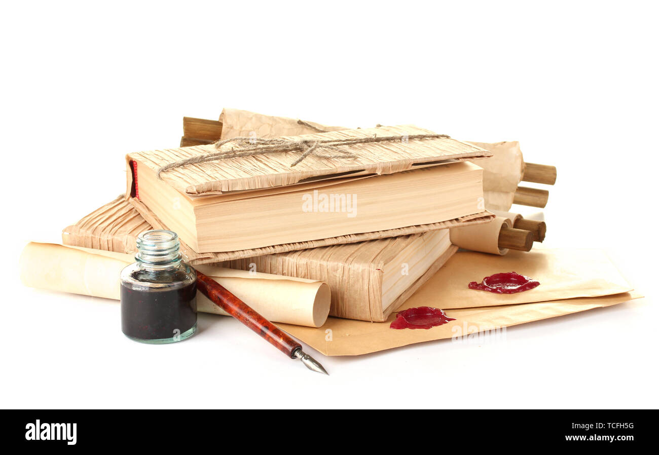 old books, ink pen and ink bottle isolated on white Stock Photo - Alamy