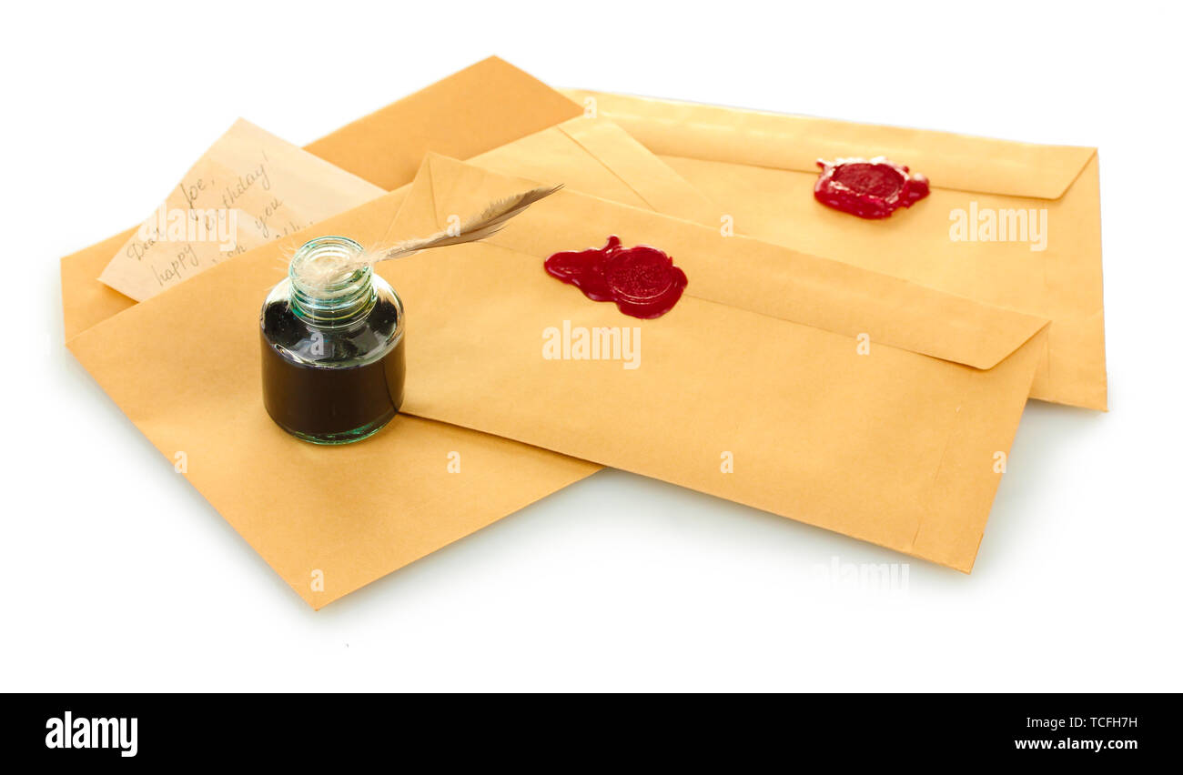 feather, ink and old letters isolated on white Stock Photo - Alamy