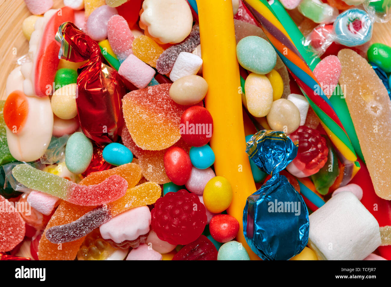 Different colorful fruit candy Stock Photo - Alamy