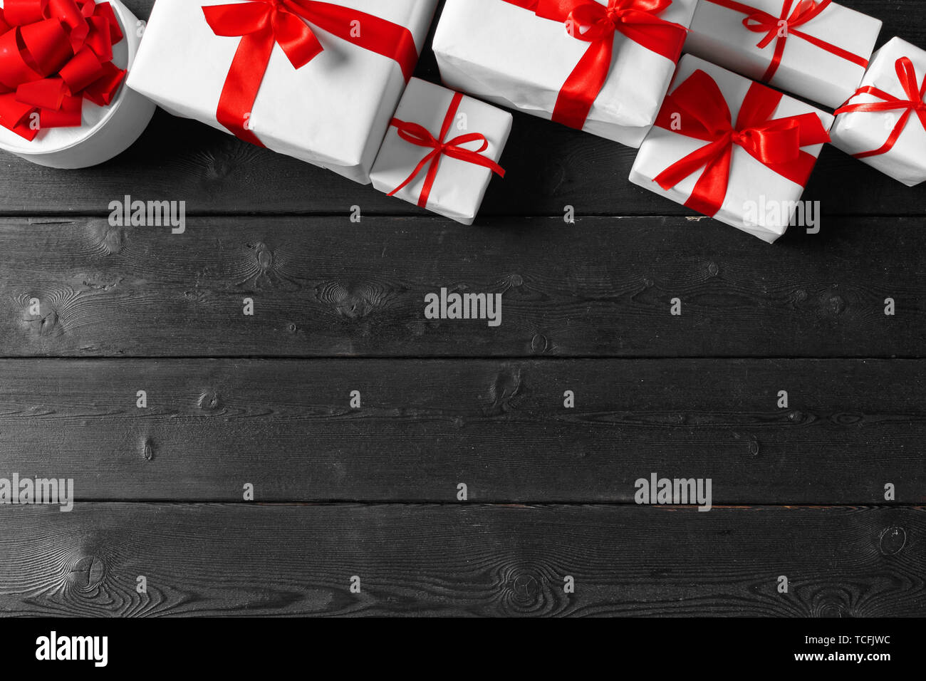 various gift boxes on wooden table, top view Stock Photo - Alamy