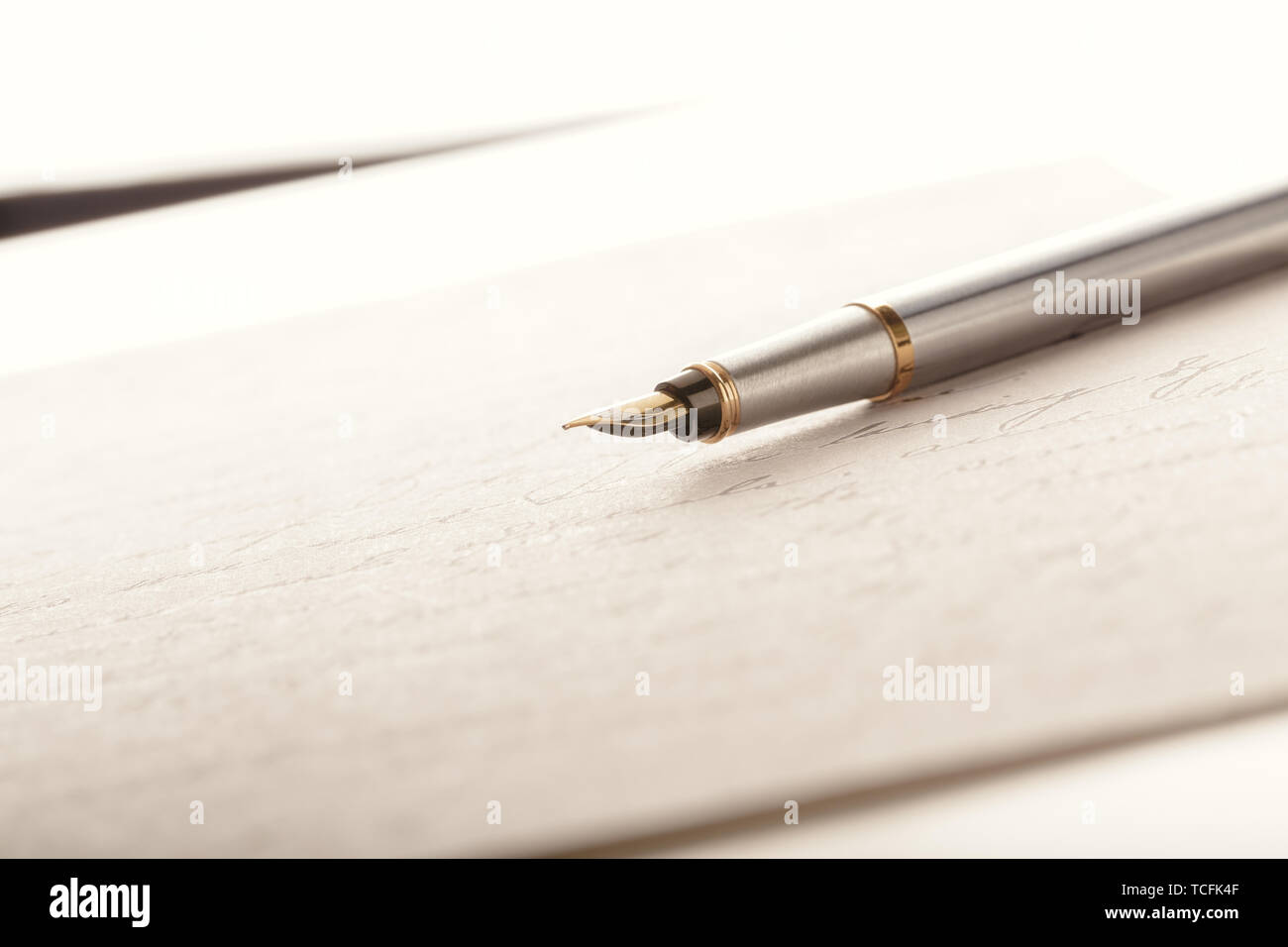 Fountain Pen on Written Page Stock Photo - Alamy