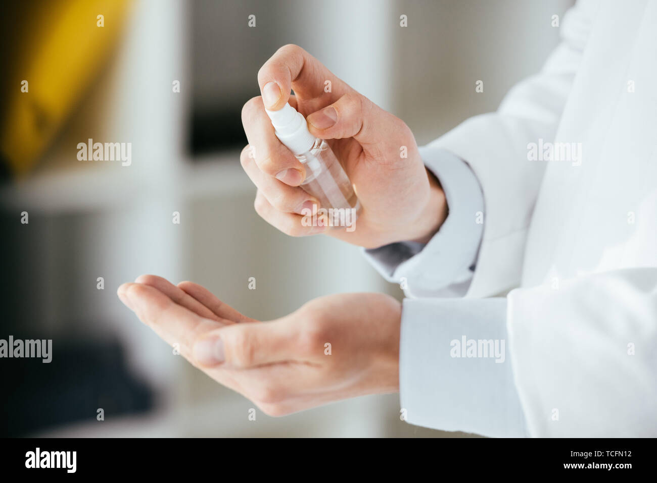 Doctor applying sanitizer on hands hi-res stock photography and images ...