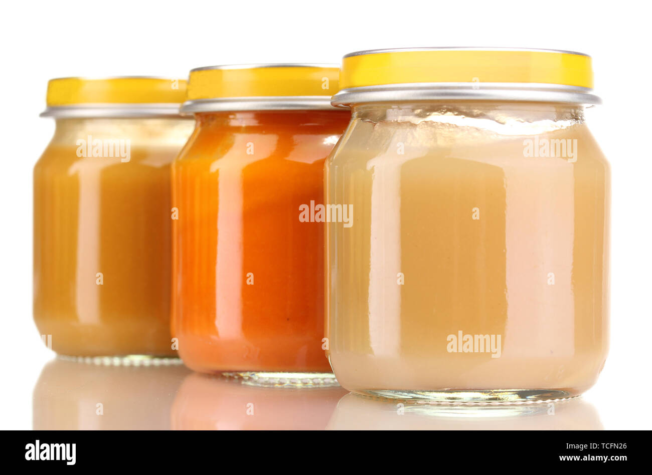 Jars of baby puree isolated on white Stock Photo - Alamy