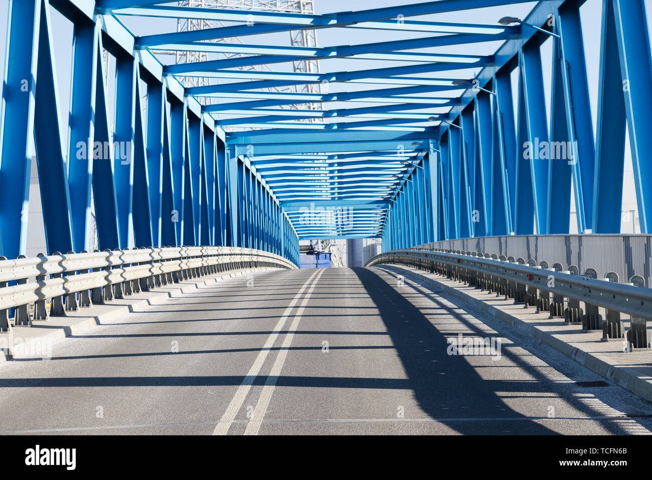 Modern bridge construction and road going through the bridge ...