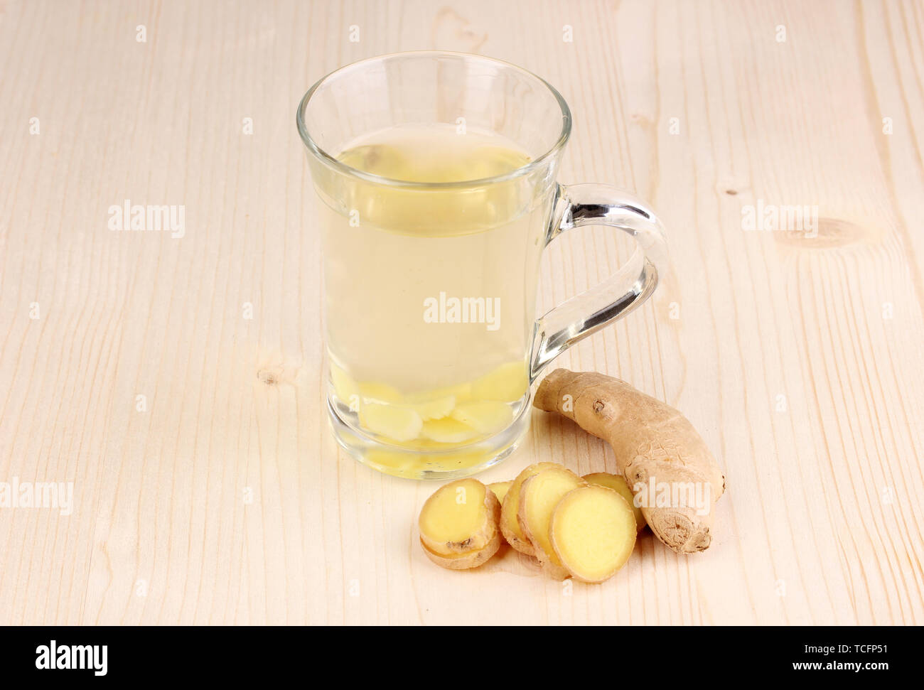 Healthy ginger tea on wooden background Stock Photo - Alamy