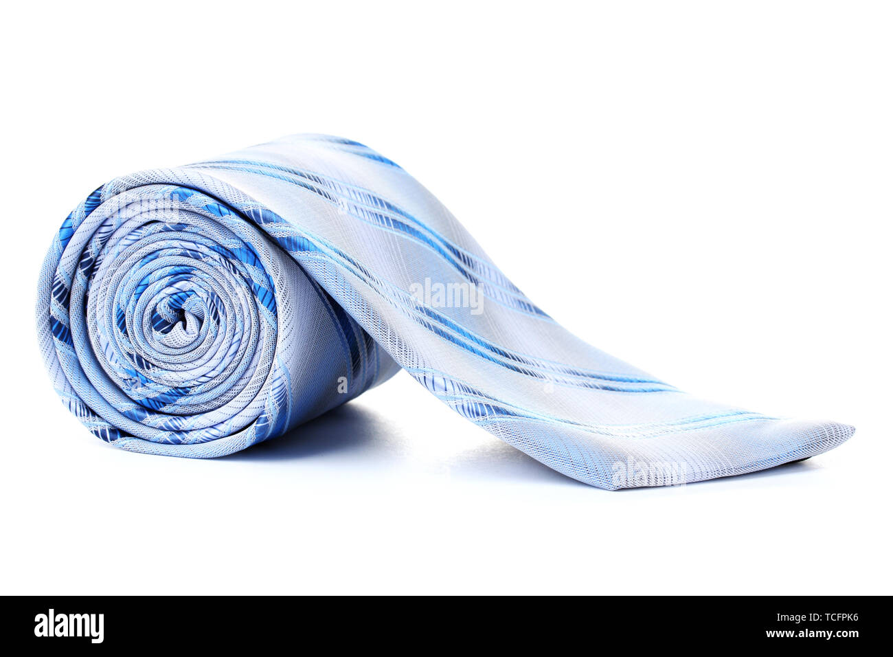 Blue rolled tie isolated on white Stock Photo - Alamy