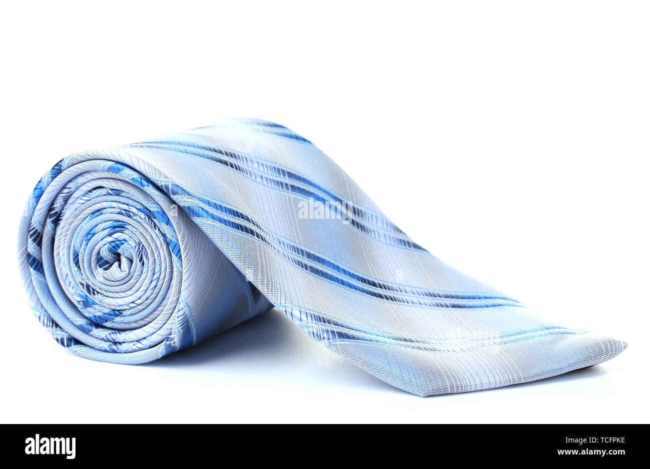 Blue rolled tie isolated on white Stock Photo - Alamy