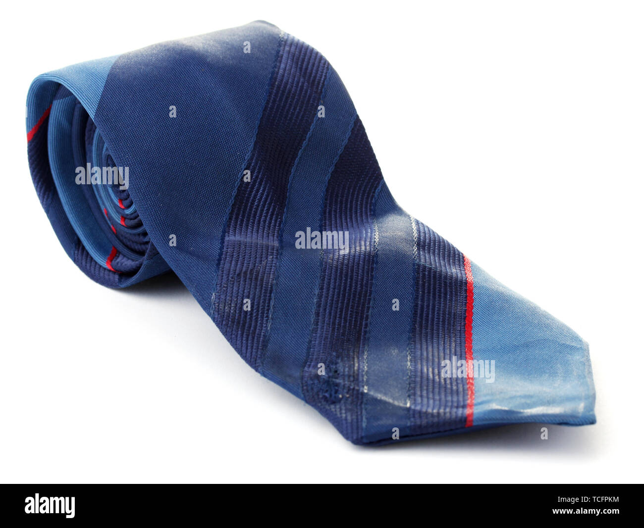 Blue rolled tie isolated on white Stock Photo - Alamy