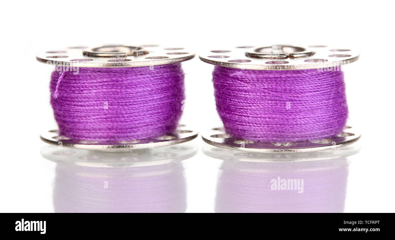 Metal spools of thread isolated on white Stock Photo - Alamy