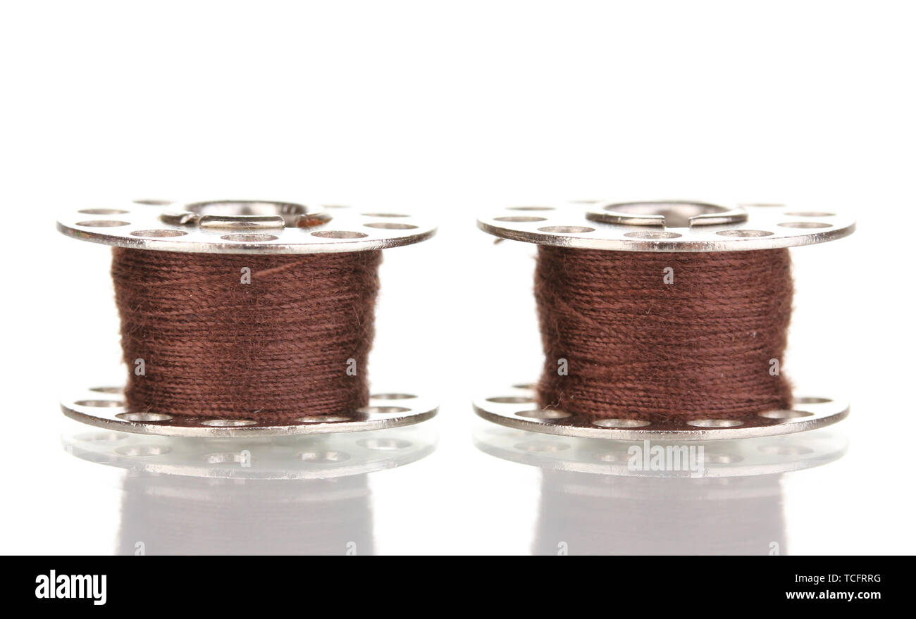 Metal spools of thread isolated on white Stock Photo - Alamy