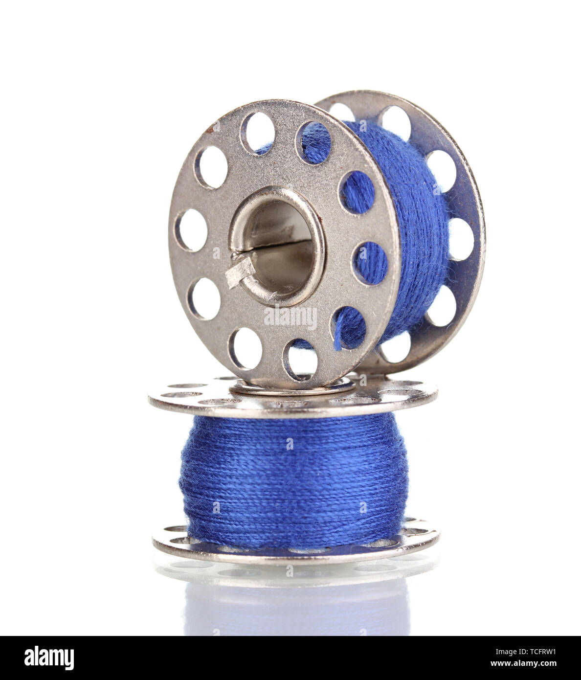 Metal spools of thread isolated on white Stock Photo - Alamy