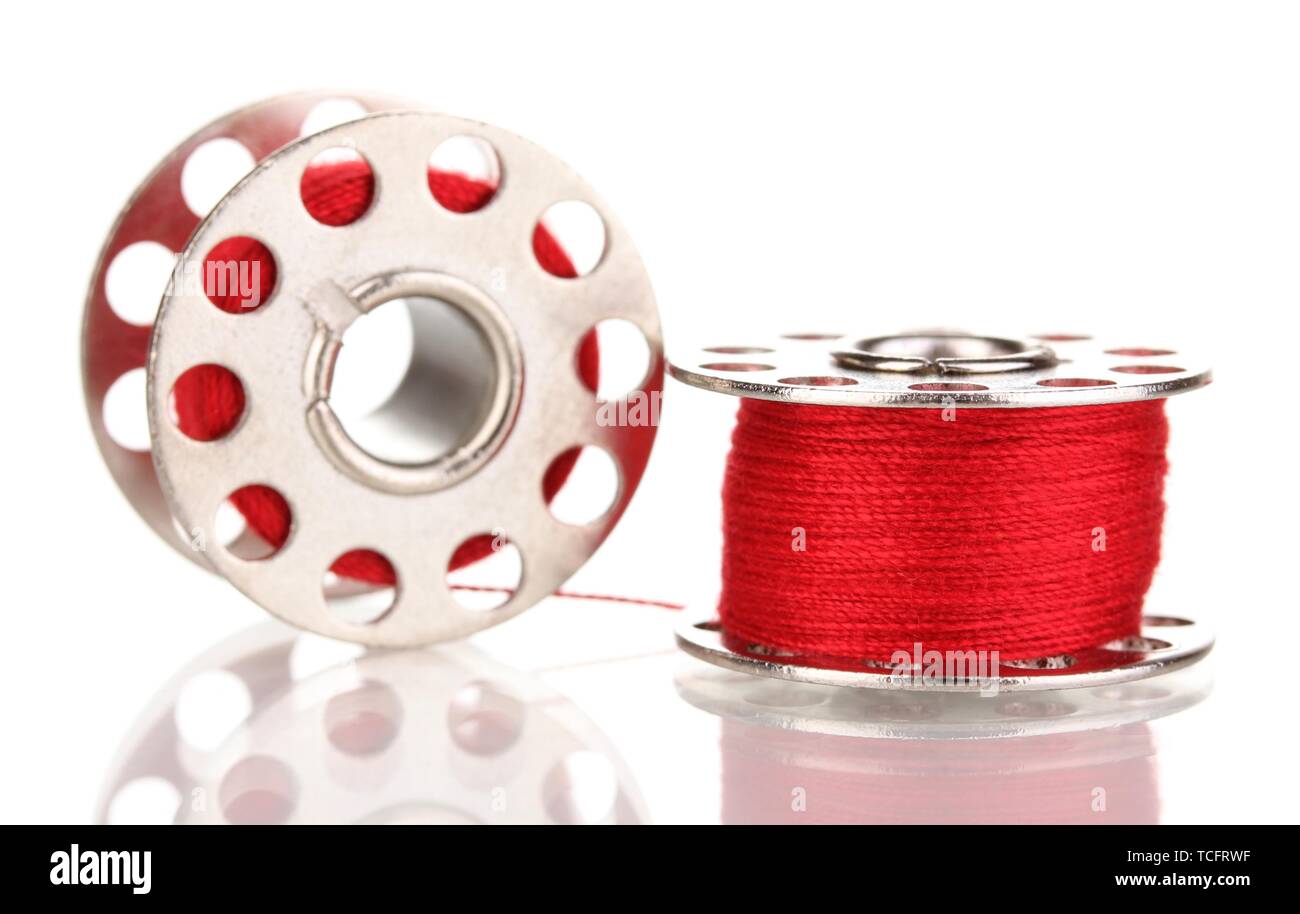 Metal spools of thread isolated on white Stock Photo - Alamy