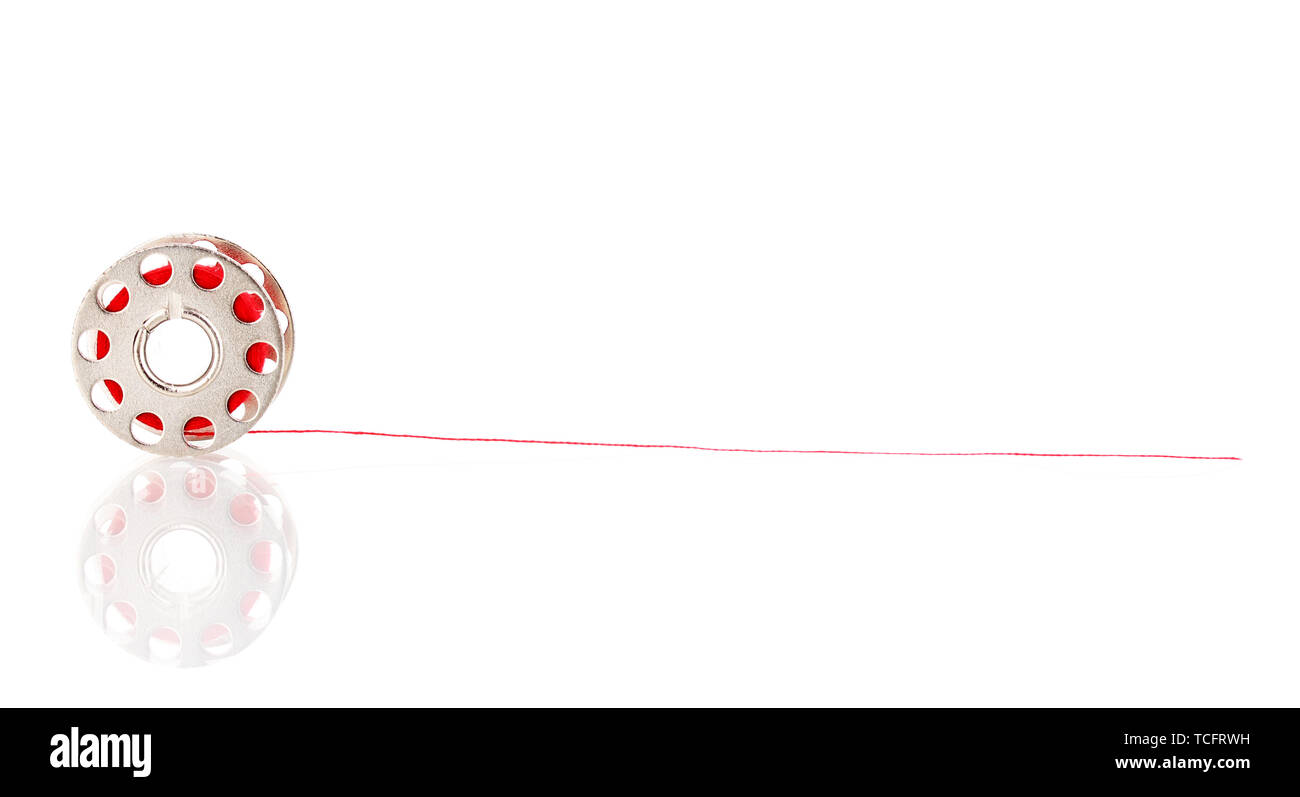 Metal spool of thread isolated on white Stock Photo - Alamy