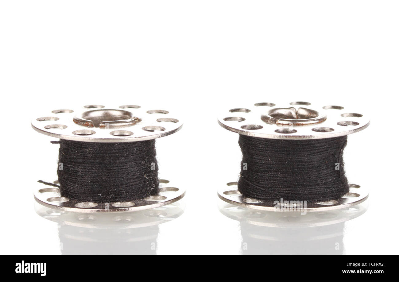 Metal spools of thread isolated on white Stock Photo - Alamy