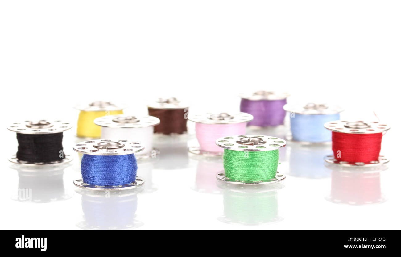 Metal spools of thread isolated on white Stock Photo - Alamy