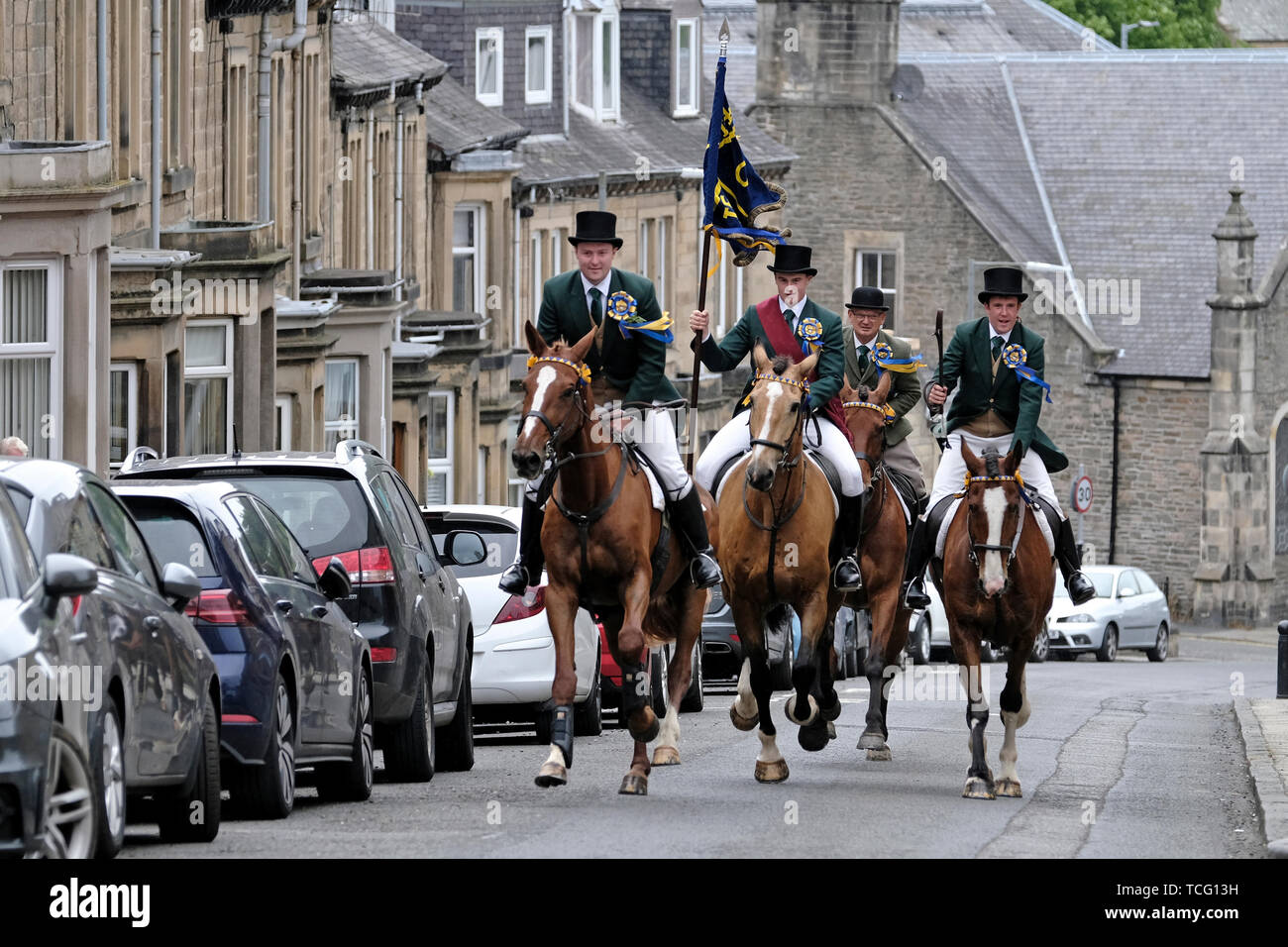 Man on horse carrying flag hi-res stock photography and images - Alamy