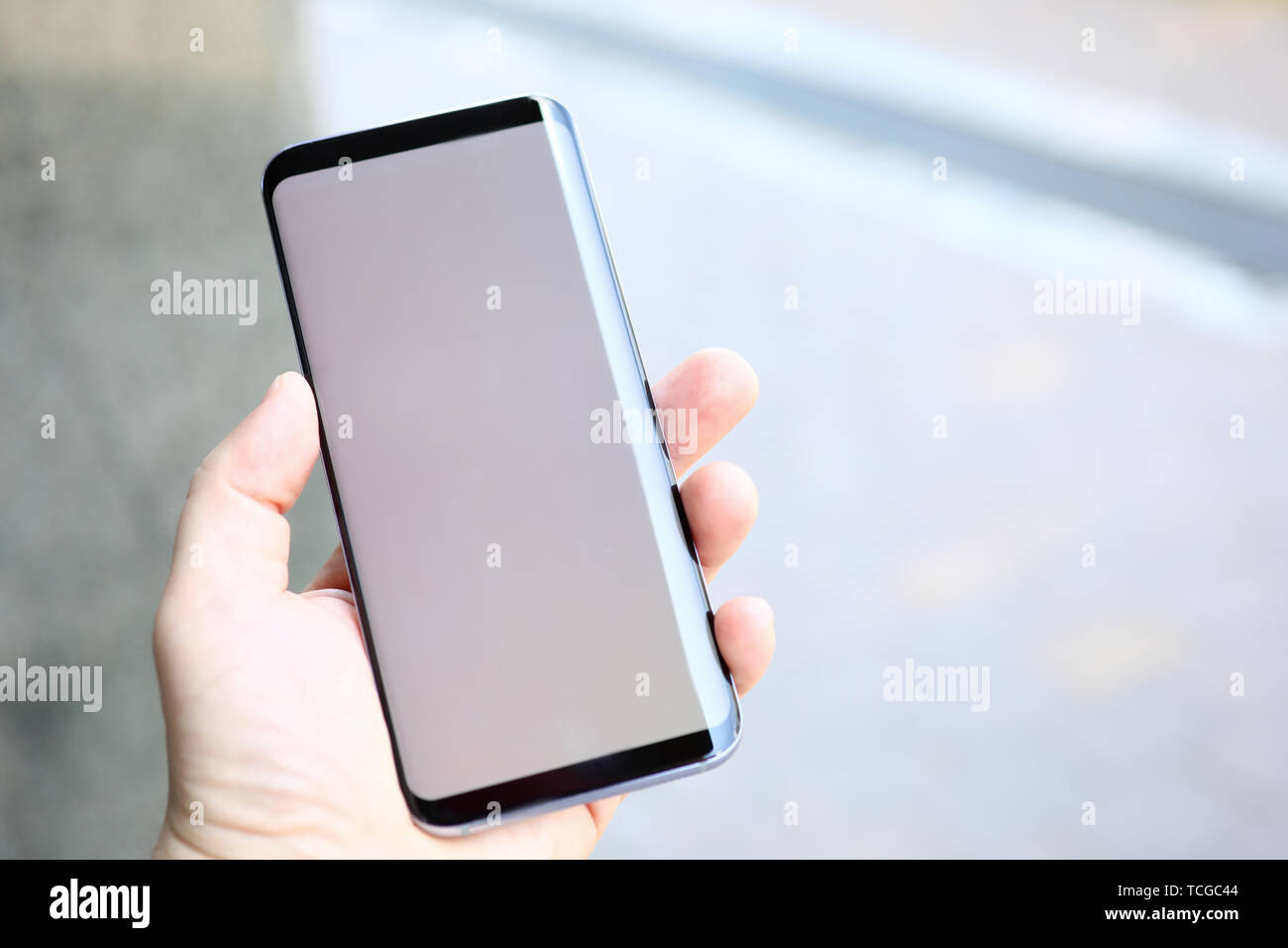 Smartphone hand hold great design for Stock Photo - Alamy