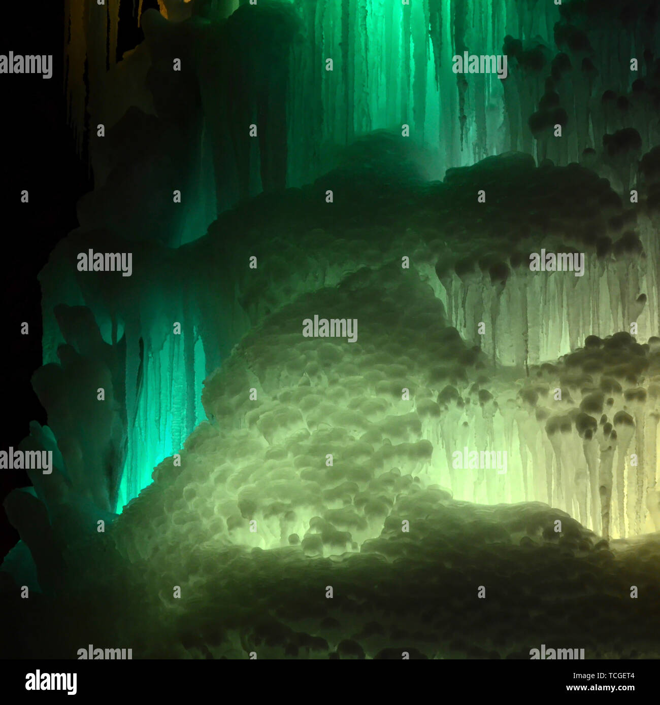 Huge ice icicles. Fragment of large blocks of ice frozen waterfall of ...