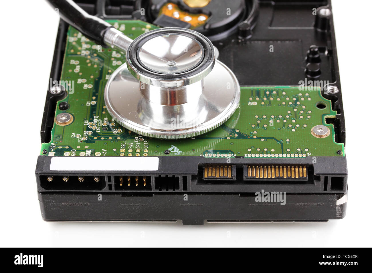 Stethoscope on hard disk drive isolated on white Stock Photo - Alamy