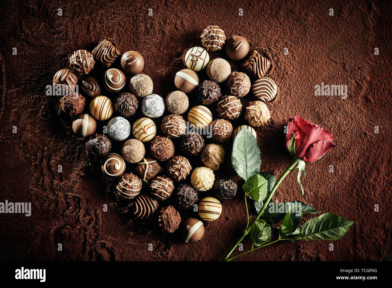 Heart shaped arrangement of assorted luxury handmade chocolates with a ...