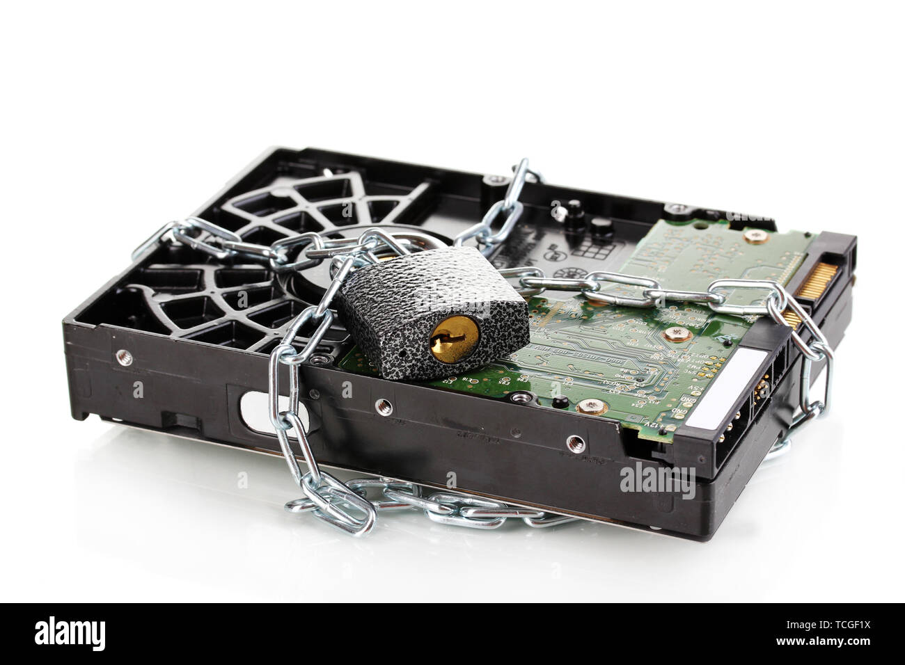 Hard disk drive on chain isolated on white Stock Photo - Alamy