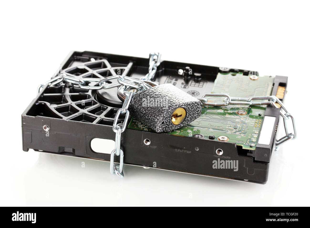 Hard disk drive on chain isolated on white Stock Photo - Alamy