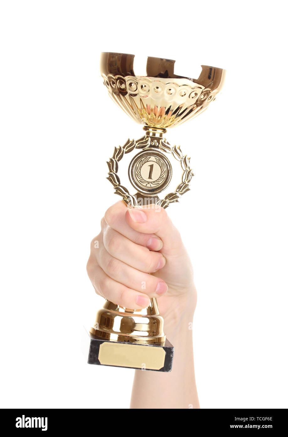 Trophy cup in hand isolated on white Stock Photo - Alamy