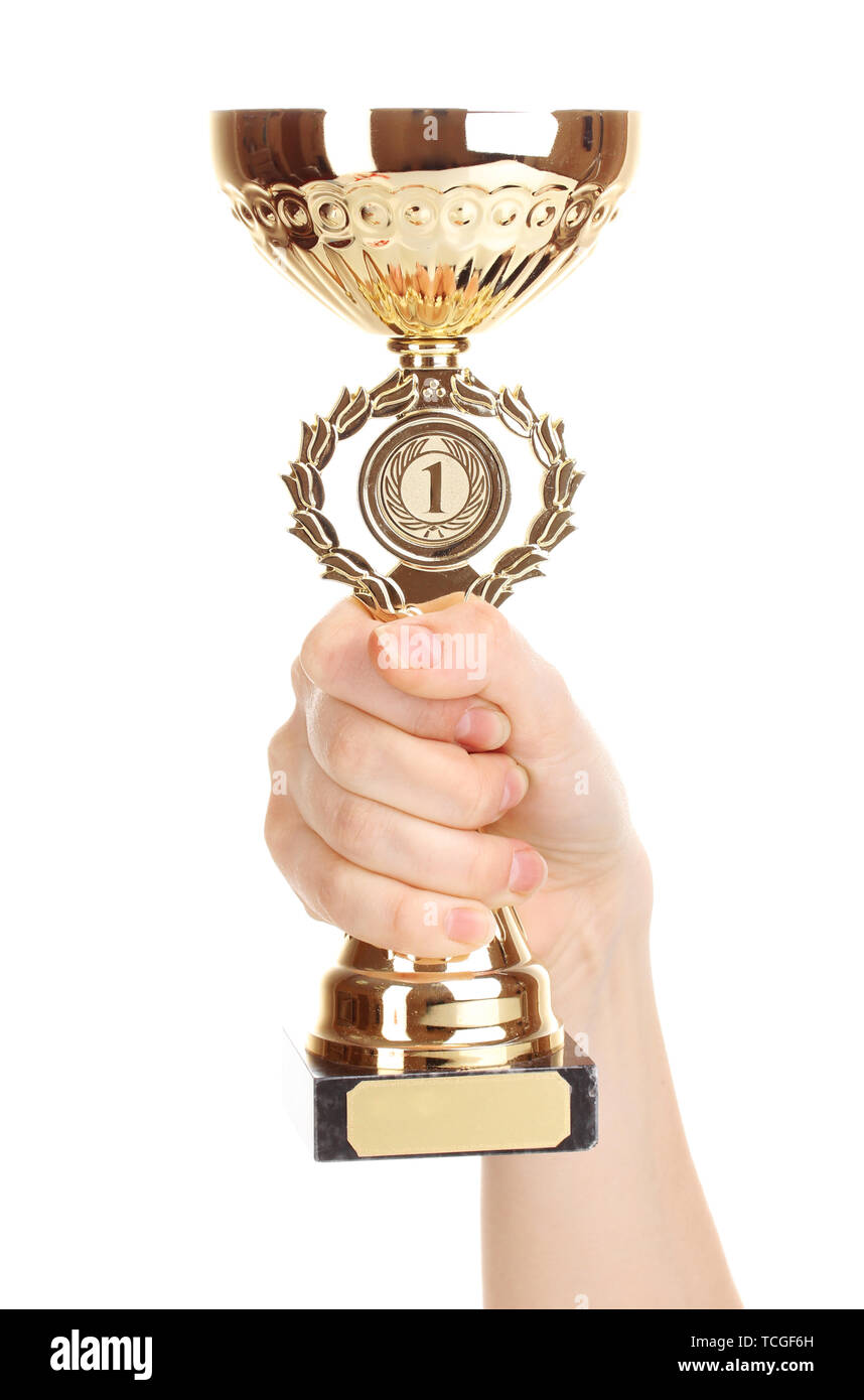 Trophy cup in hand isolated on white Stock Photo - Alamy