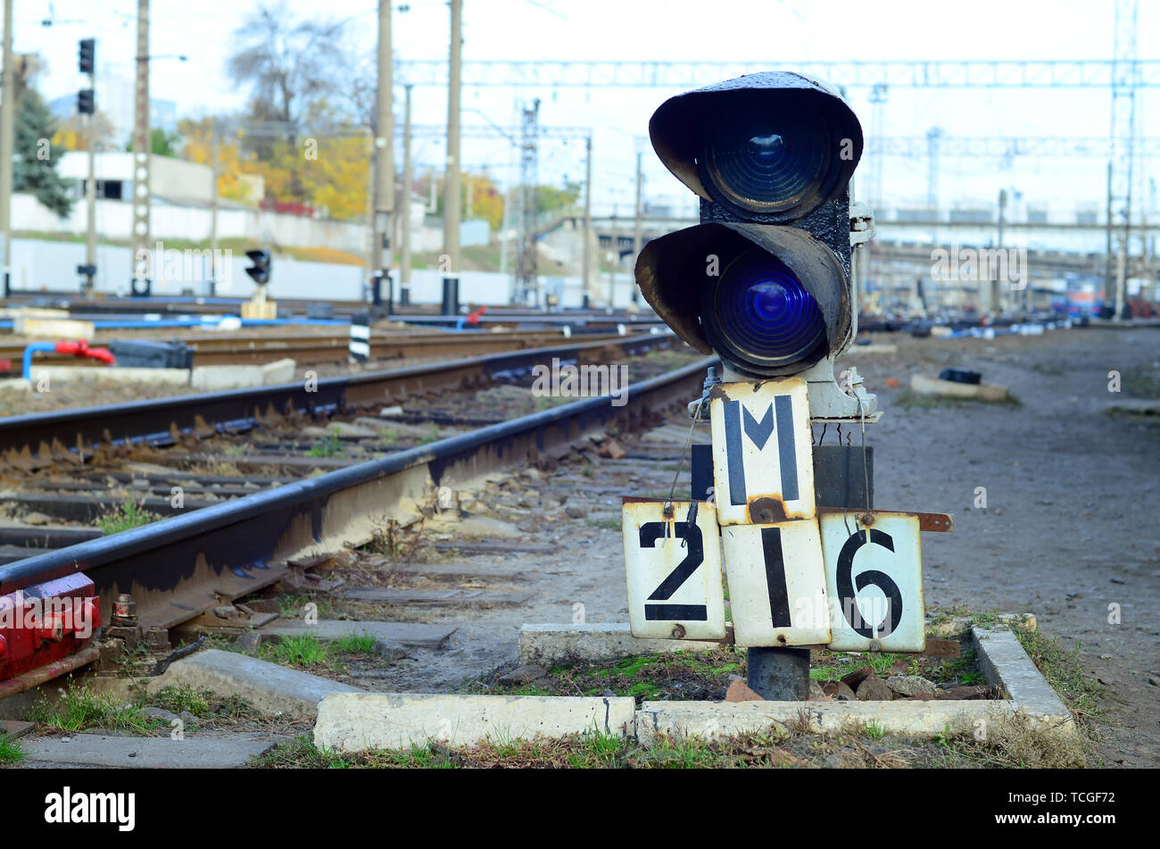 Railway semaphore traffic light against the background of a day railway ...