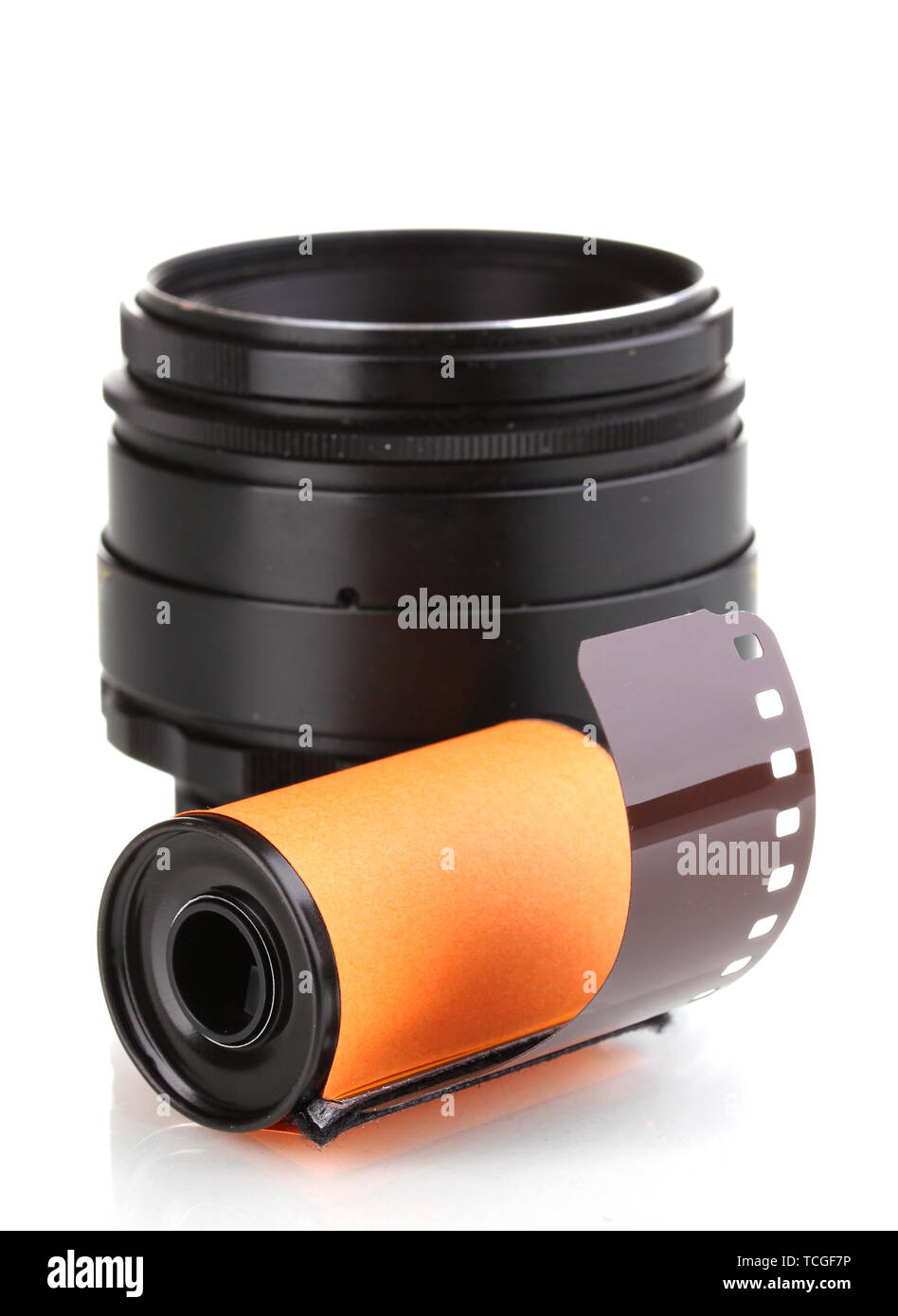 New photo film in cartridge and camera lens isolated on white Stock ...