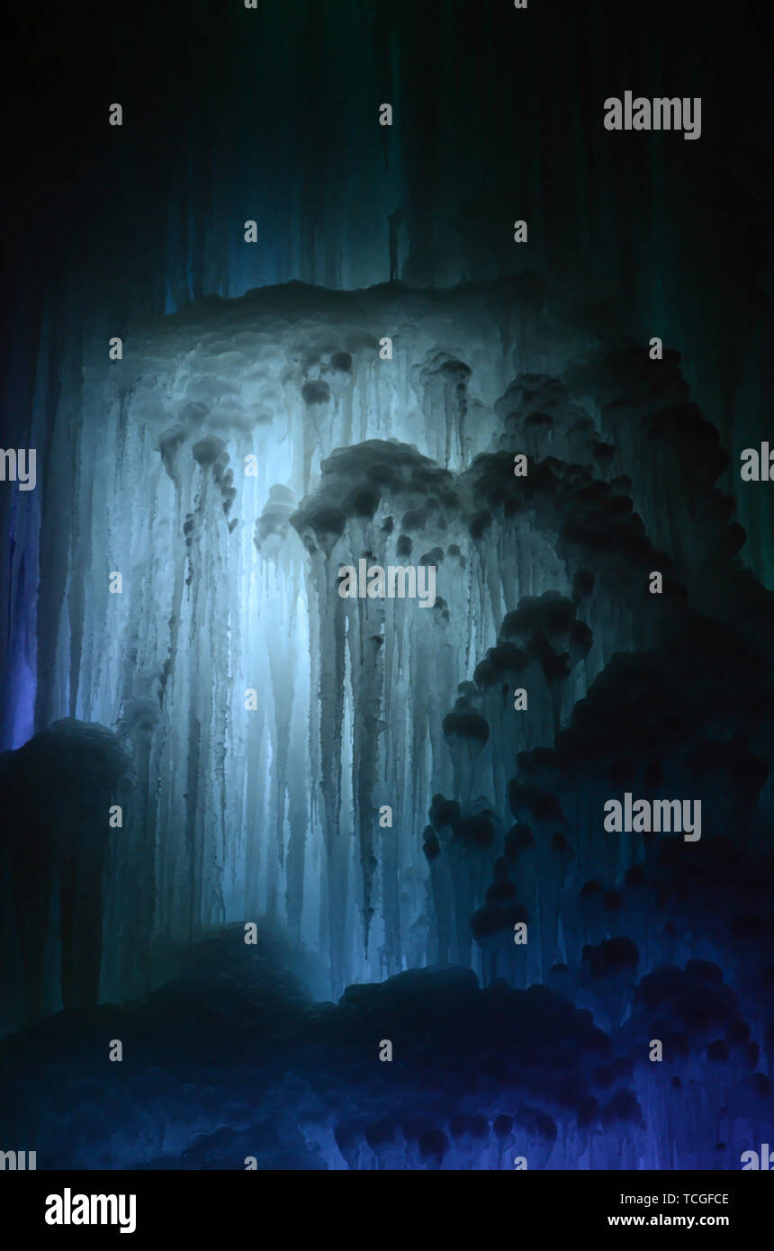 Huge ice icicles. Fragment of large blocks of ice frozen waterfall of ...