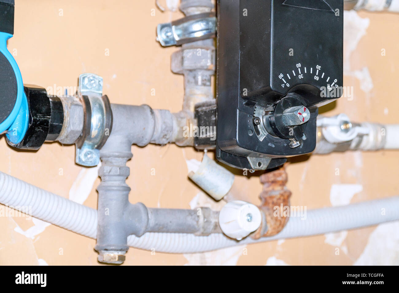 Connection of the supply pump in the home heating system Stock Photo ...