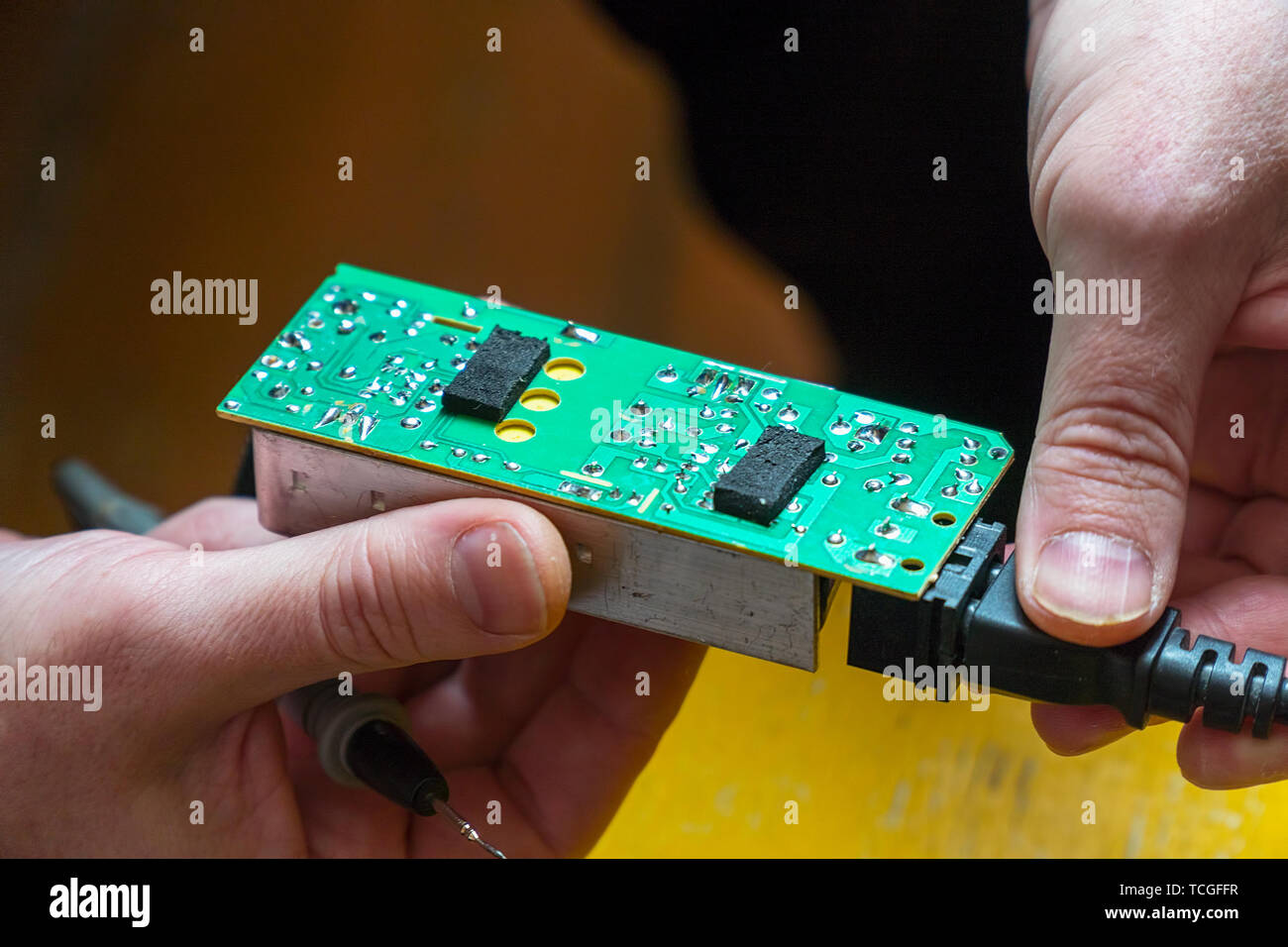 Repair of electronic board Stock Photo - Alamy