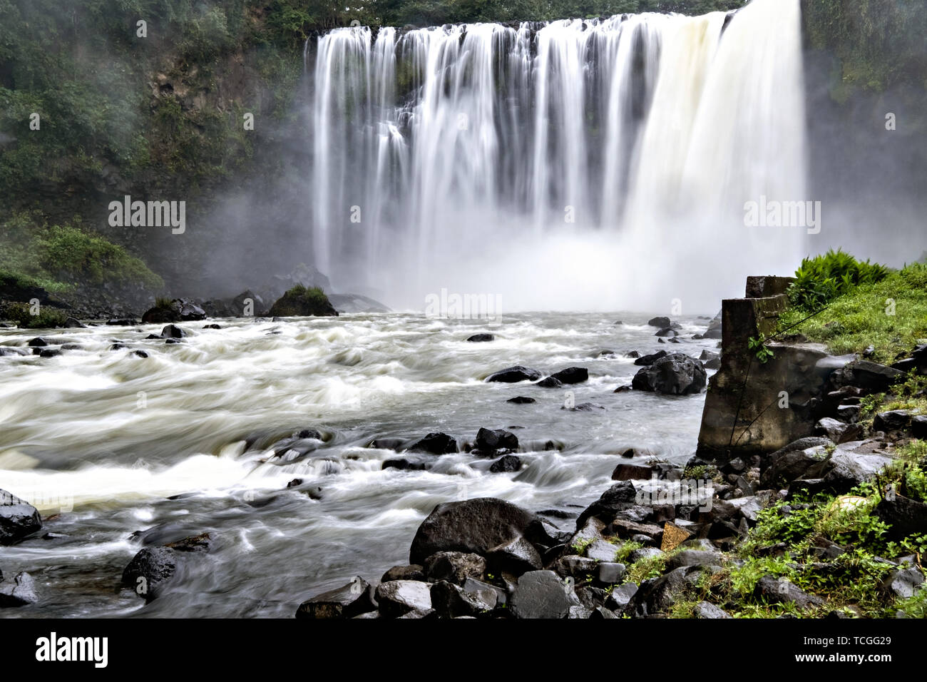 The massive Eyipantla Falls where the Catemaco River drops 50-meters to ...