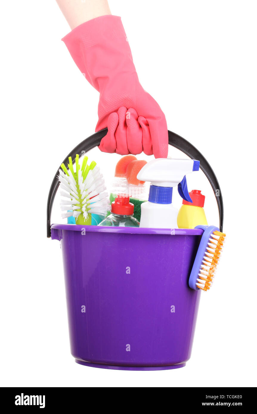 Bucket with cleaning items in hand isolated on white Stock Photo - Alamy