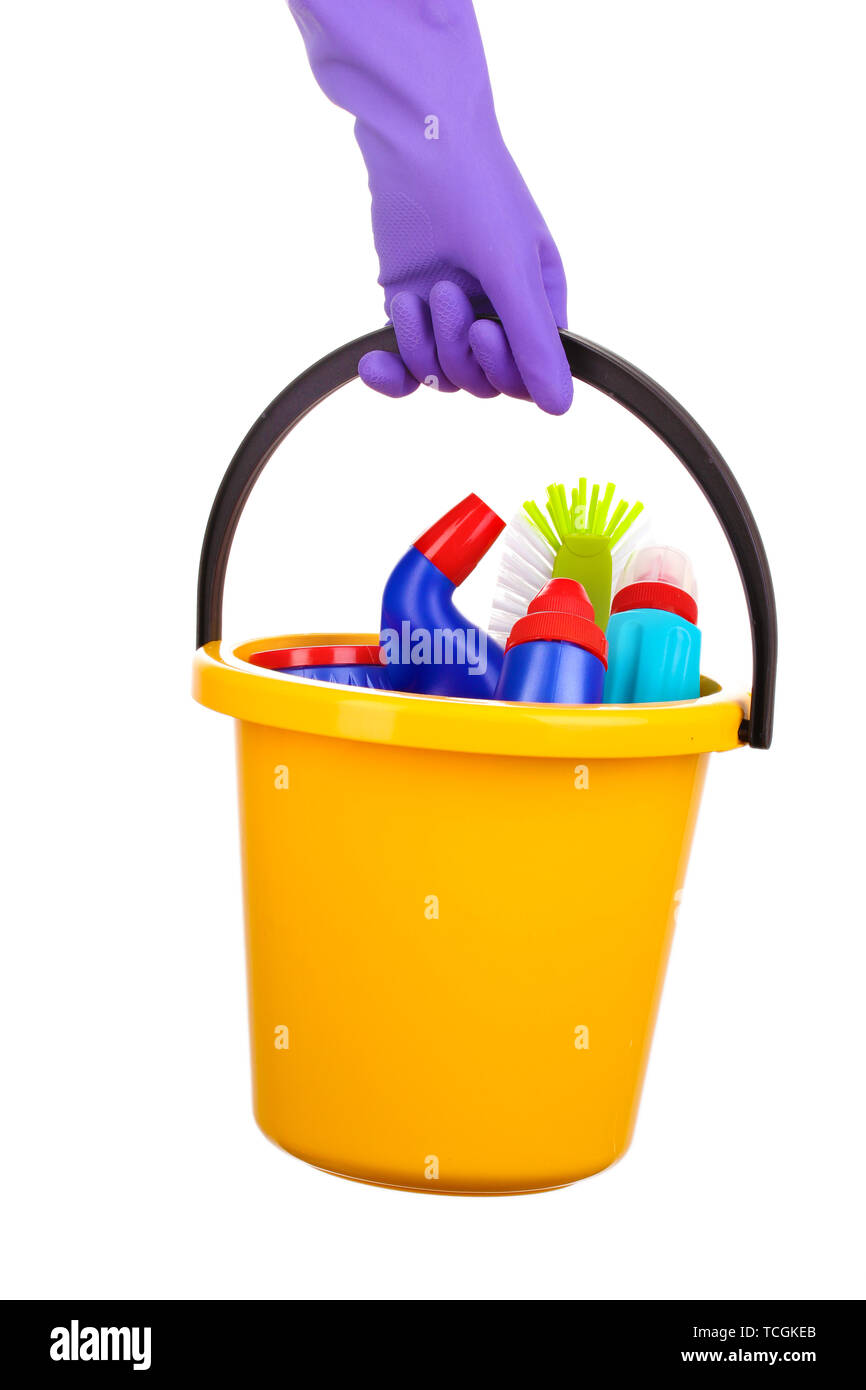 Bucket with cleaning items in hand isolated on white Stock Photo - Alamy