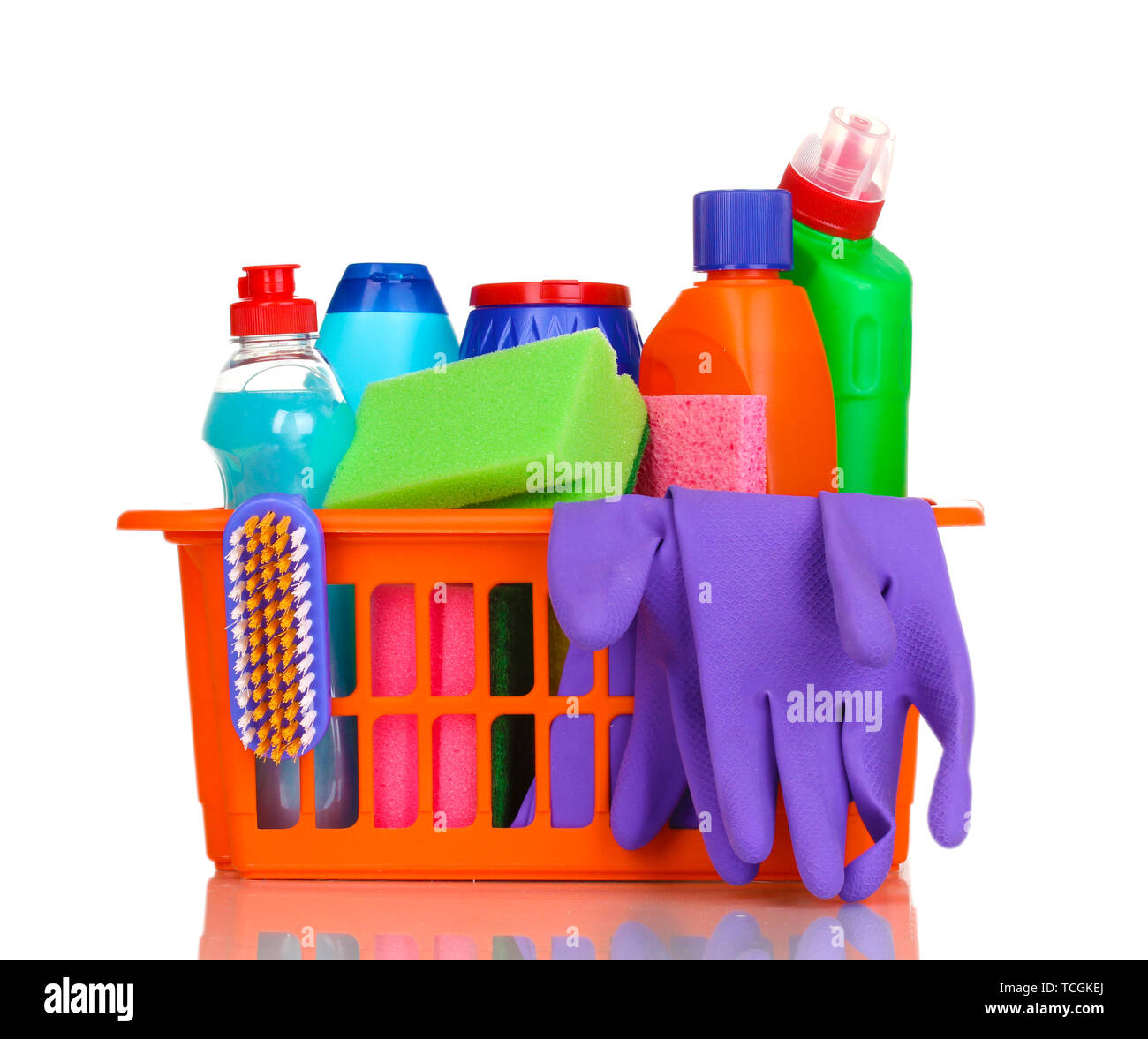 Cleaning items in plastic basket isolated on white Stock Photo - Alamy