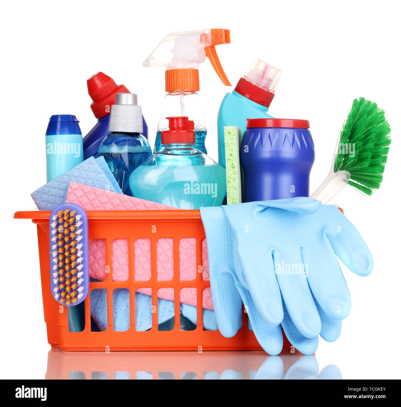 Cleaning items in plastic basket isolated on white Stock Photo - Alamy