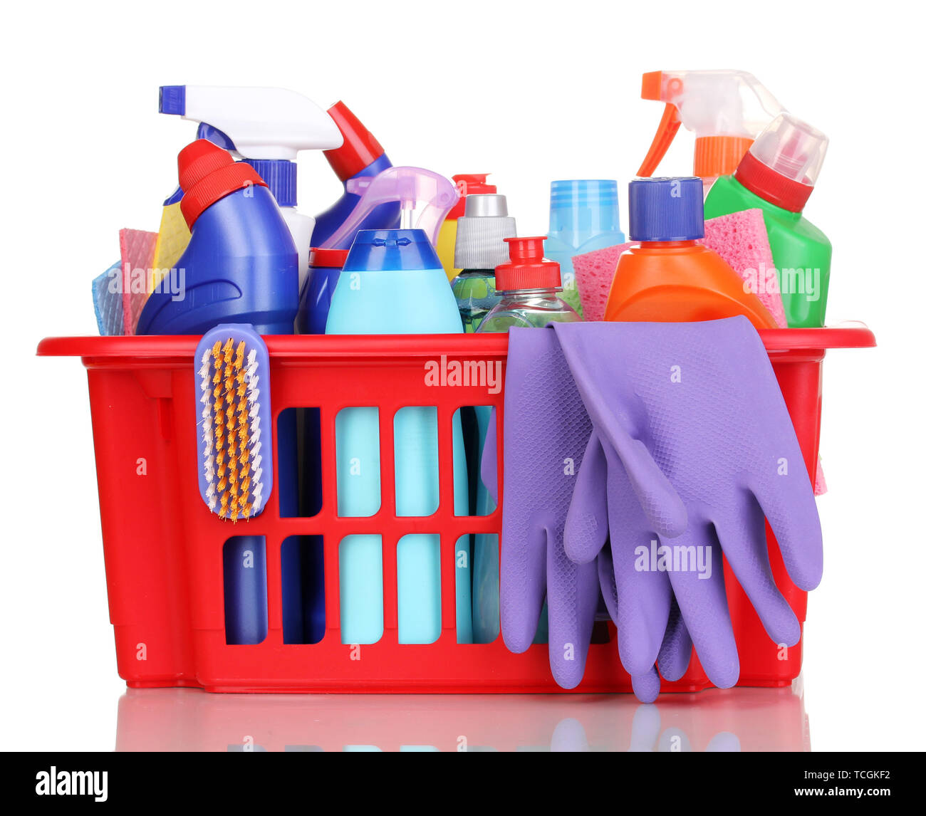 Cleaning items in plastic basket isolated on white Stock Photo - Alamy
