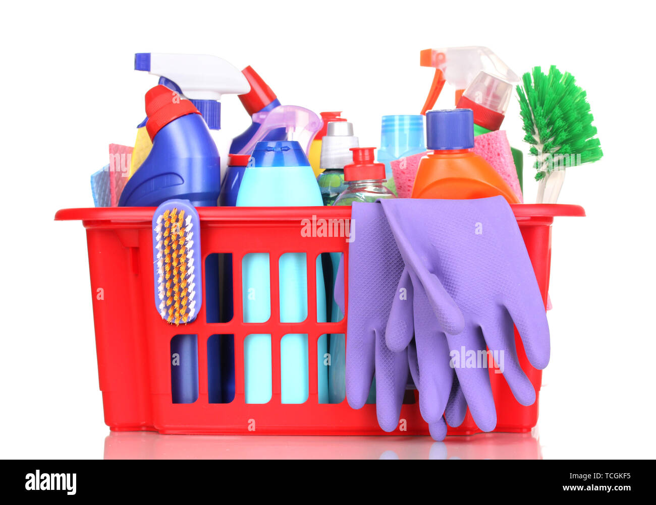 Cleaning items in plastic basket isolated on white Stock Photo - Alamy