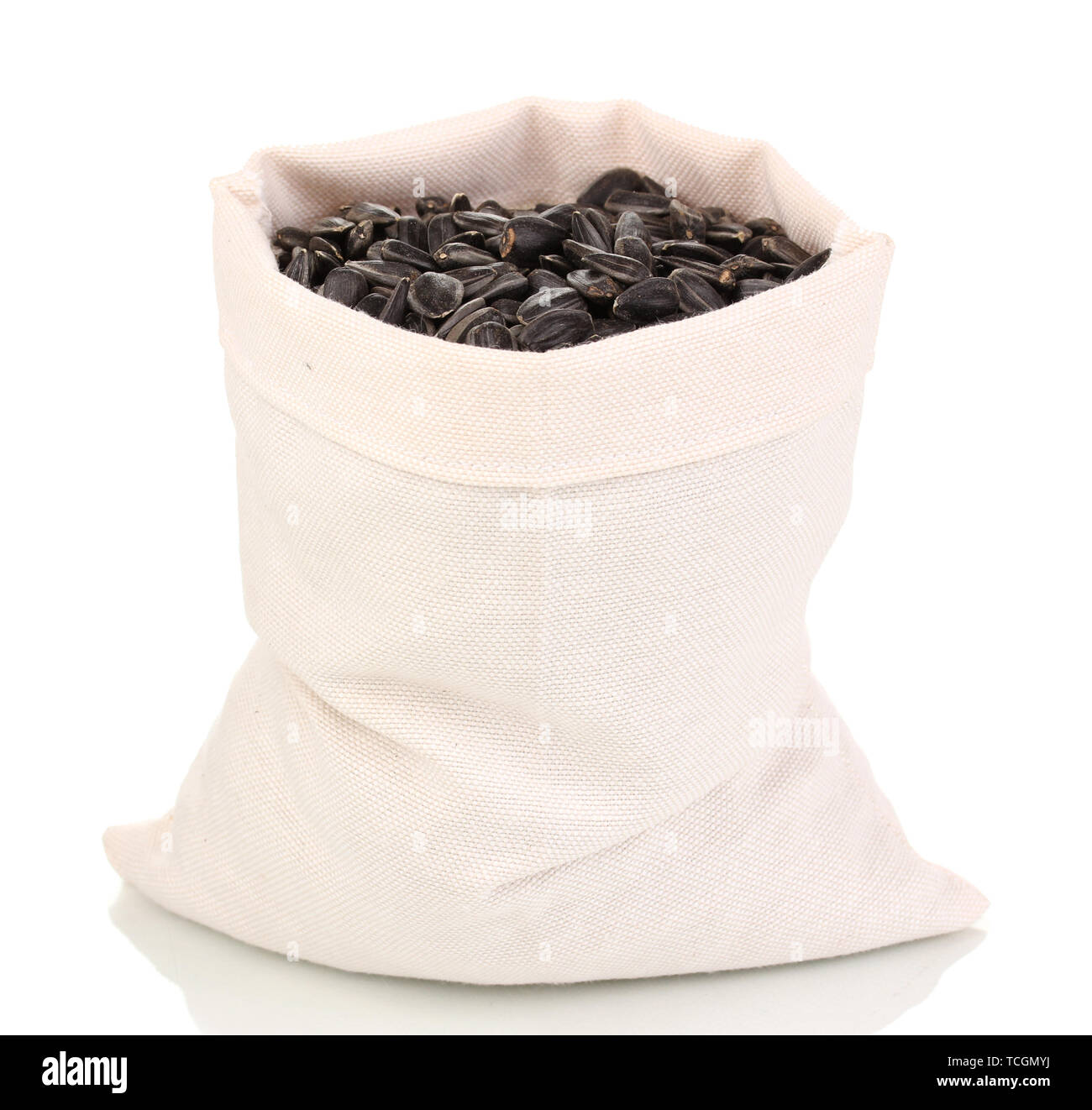 Cloth bag of sunflower seeds isolated on white Stock Photo - Alamy
