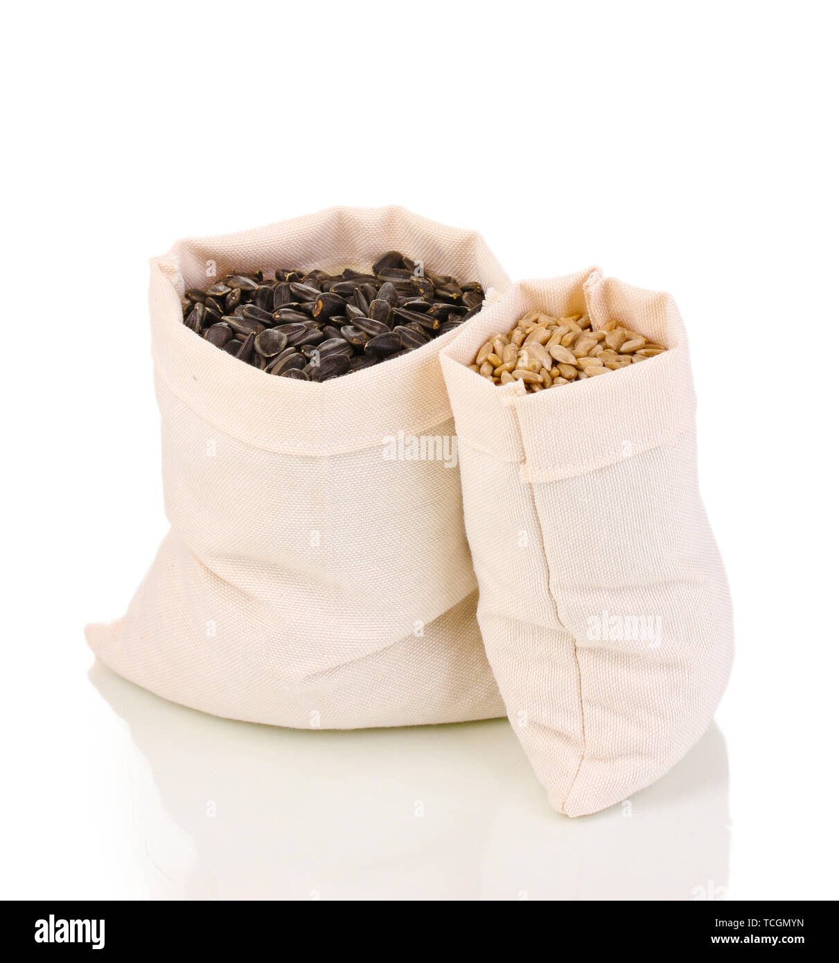 Cloth bags of sunflower seeds isolated on white Stock Photo - Alamy