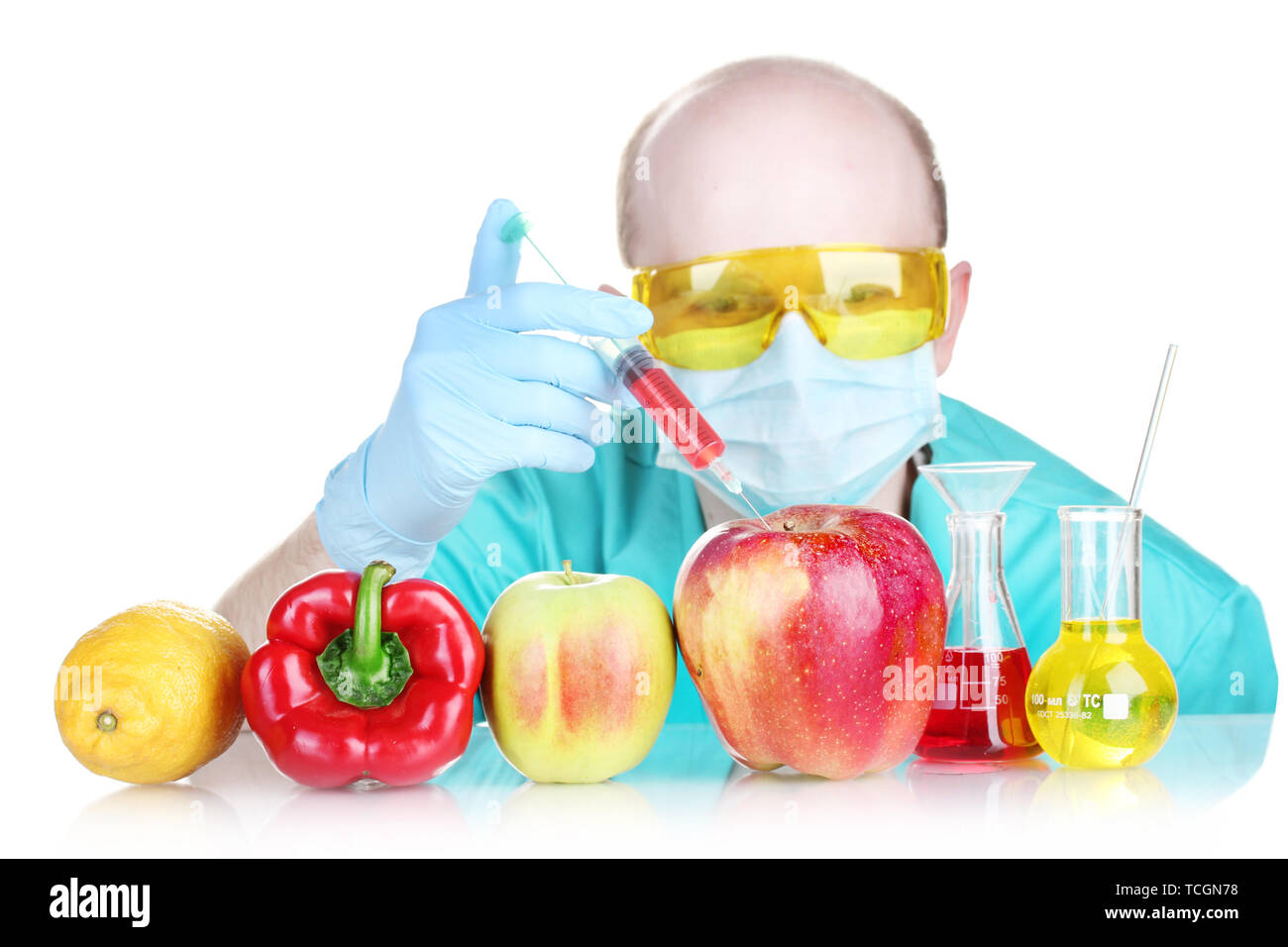 Scientist injecting GMO into the vegetables Stock Photo - Alamy