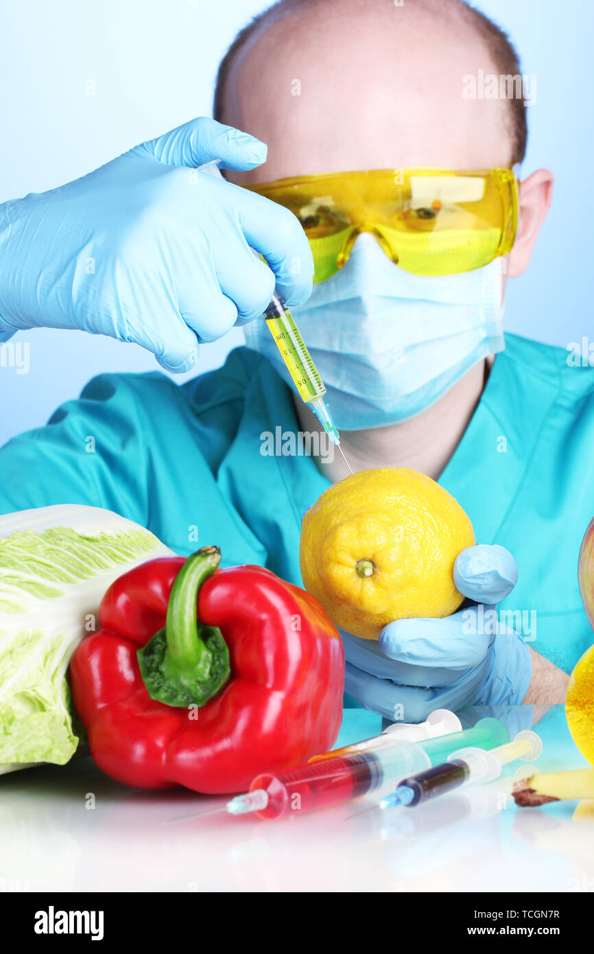 Scientist injecting lemon hi-res stock photography and images - Alamy
