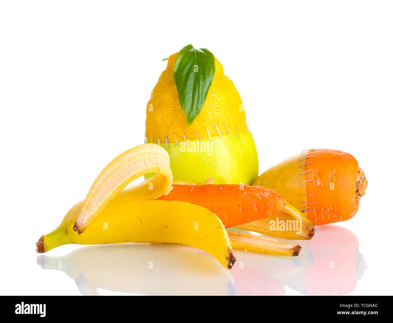 Genetically modified vegetables and fruits isolated on white Stock ...