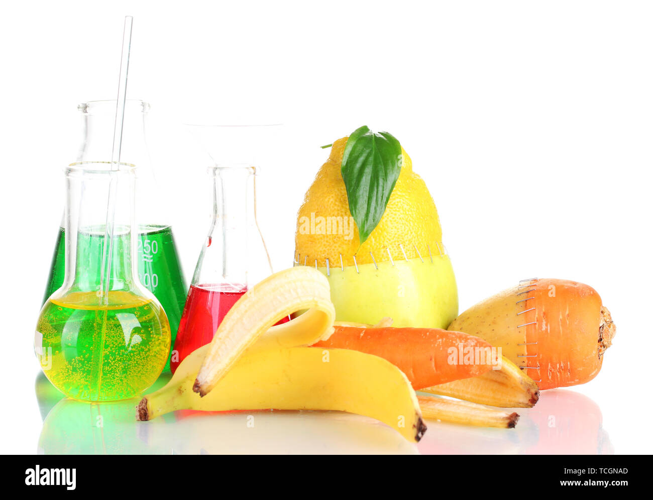 Genetically modified vegetables and fruits isolated on white Stock ...